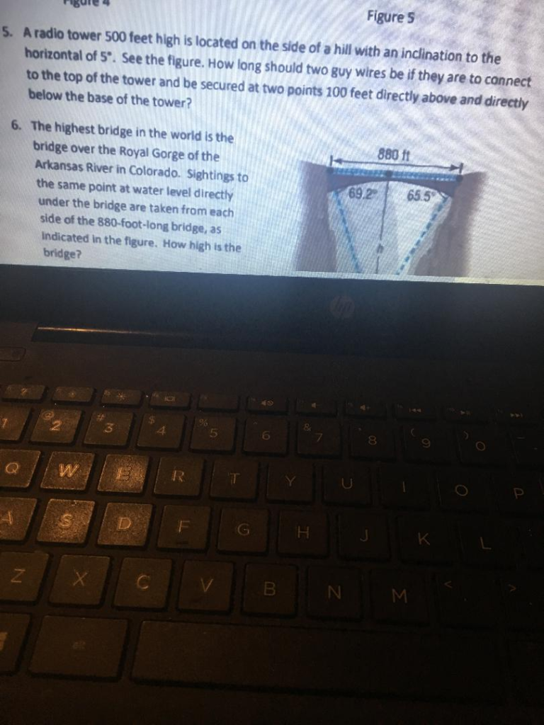 Solved Figure S 5. A radio tower 500 feet high is located on | Chegg.com