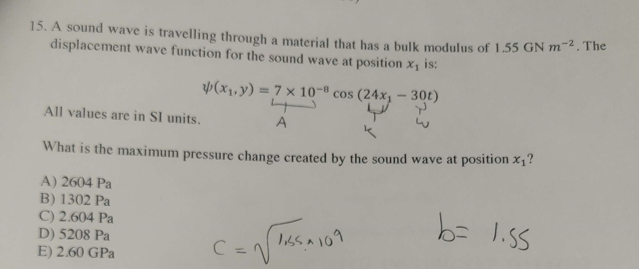 Solved 15. A sound wave is travelling through a material | Chegg.com