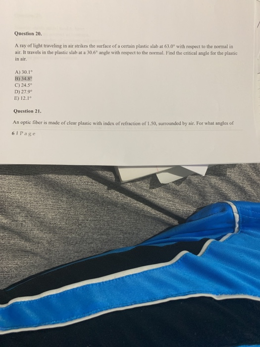 Solved Question 20. A ray of light traveling in air strikes | Chegg.com