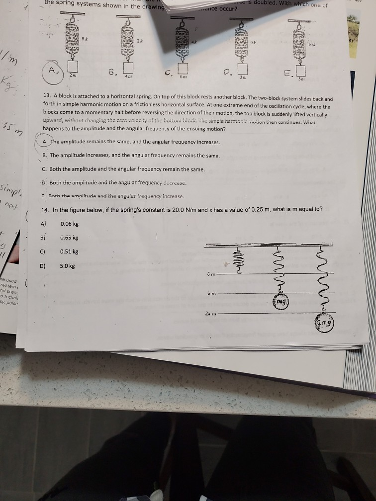 Solved the spring systems shown in the drawing uc is | Chegg.com