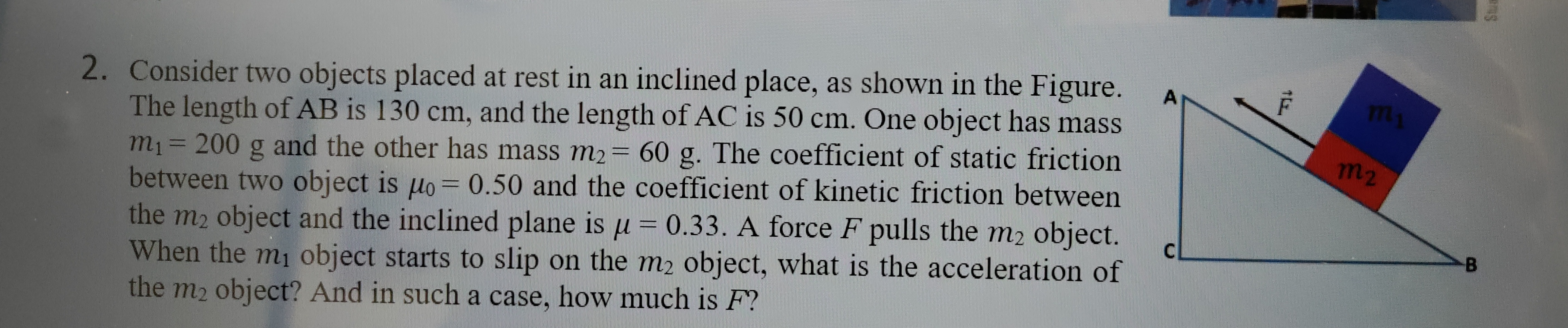 Solved 2. Consider two objects placed at rest in an inclined | Chegg.com