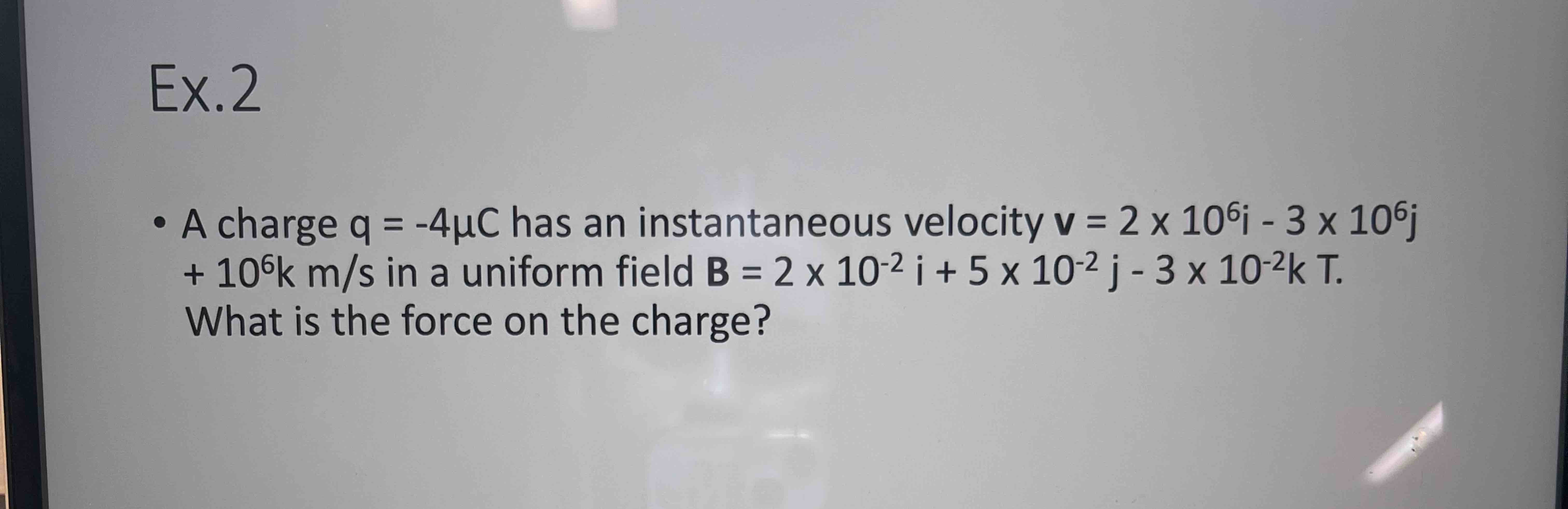 Solved Ex. 2A charge q=-4μC ﻿has an ﻿instantaneous velocity | Chegg.com