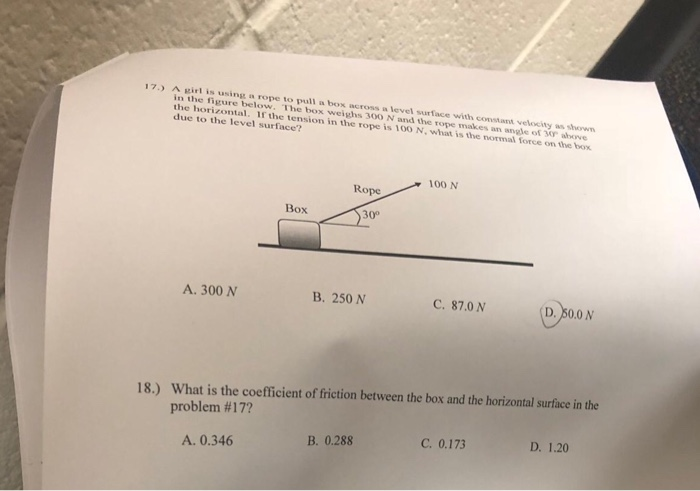 Solved 17) A girl is using a rope to pull a box across a | Chegg.com
