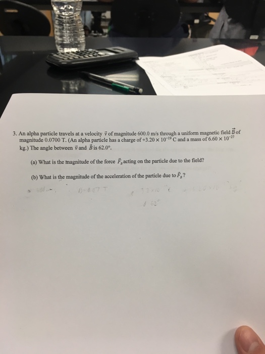 Solved An alpha particle travels at a velocity v of | Chegg.com