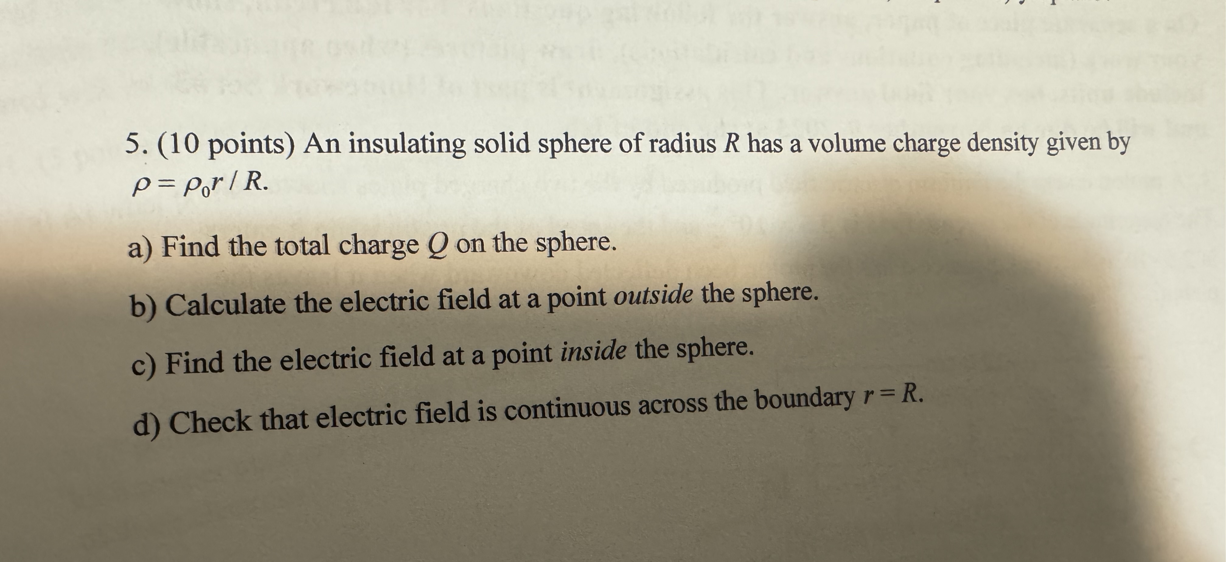 Solved An insulating solid sphere of radius R has a volume | Chegg.com