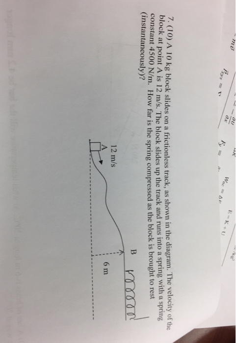 Solved 7. (10) A 10 kg block slides on a frictionless track, | Chegg.com