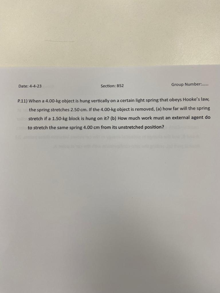Solved P.11) When a 4.00- kg object is hung vertically on a | Chegg.com