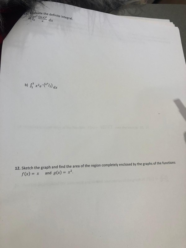 Solved Evaluate the definite inte and On 2) b) { x²e -(+"/2) | Chegg.com