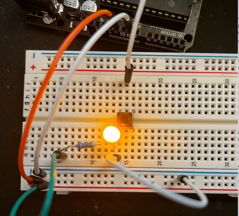 Solved How to make the LED Turns on when the button is not | Chegg.com