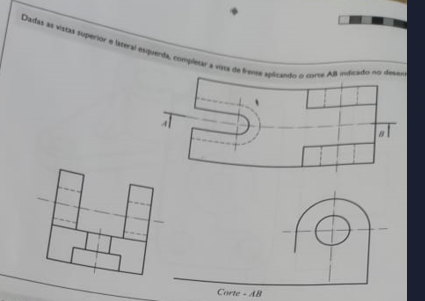 Solved Given the top and left side views, complete the front | Chegg.com
