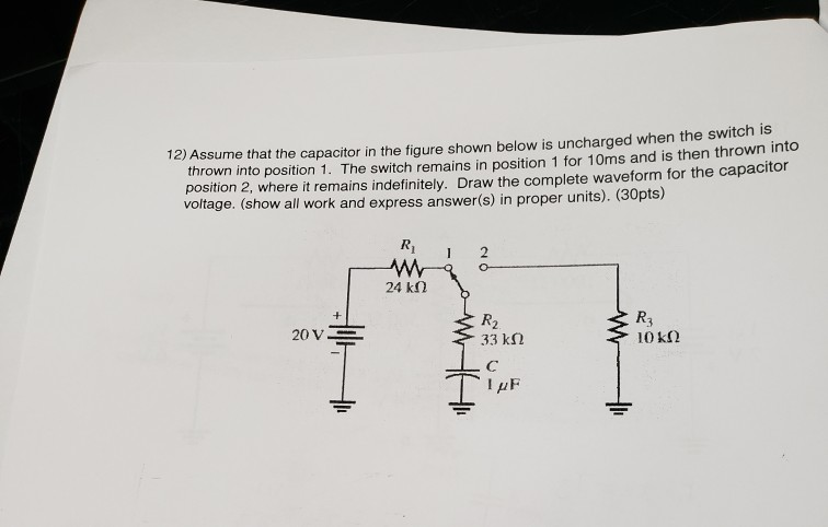 Solved 12) Assume that the capacitor in the figure shown | Chegg.com