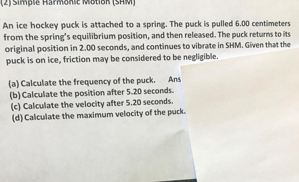 Solved (2) Simple Harmonic Motion (SHIM) An ice hockey puck | Chegg.com