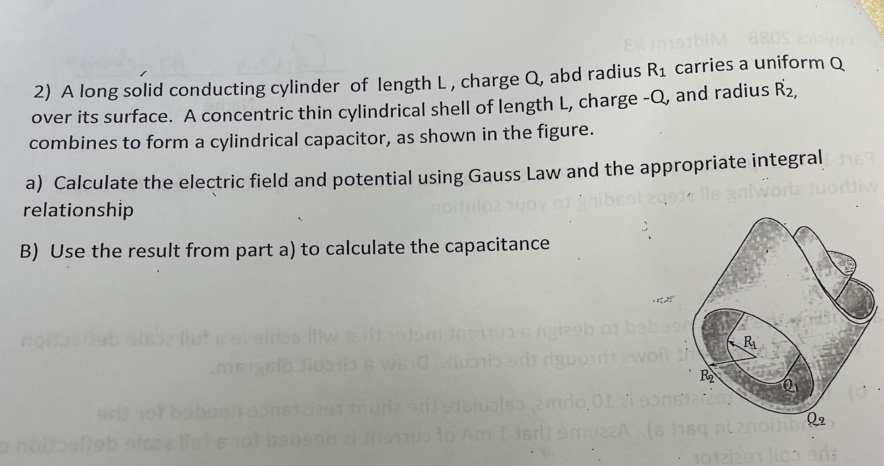 Solved A long solid conducting cylinder of length L, ﻿charge | Chegg.com