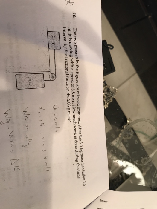Solved 10. The two masses in th e figure are released from | Chegg.com