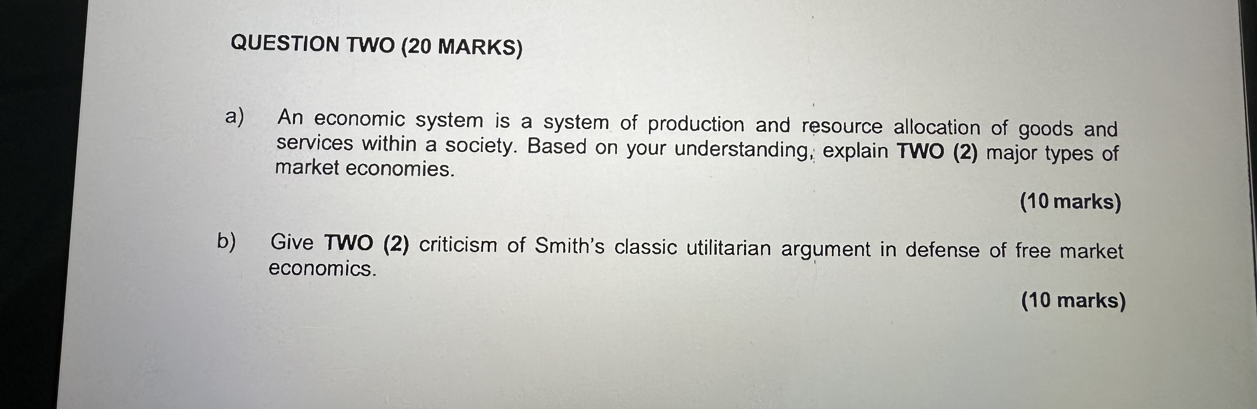 Solved QUESTION TWO (20 MARKS) a) An economic system is a | Chegg.com