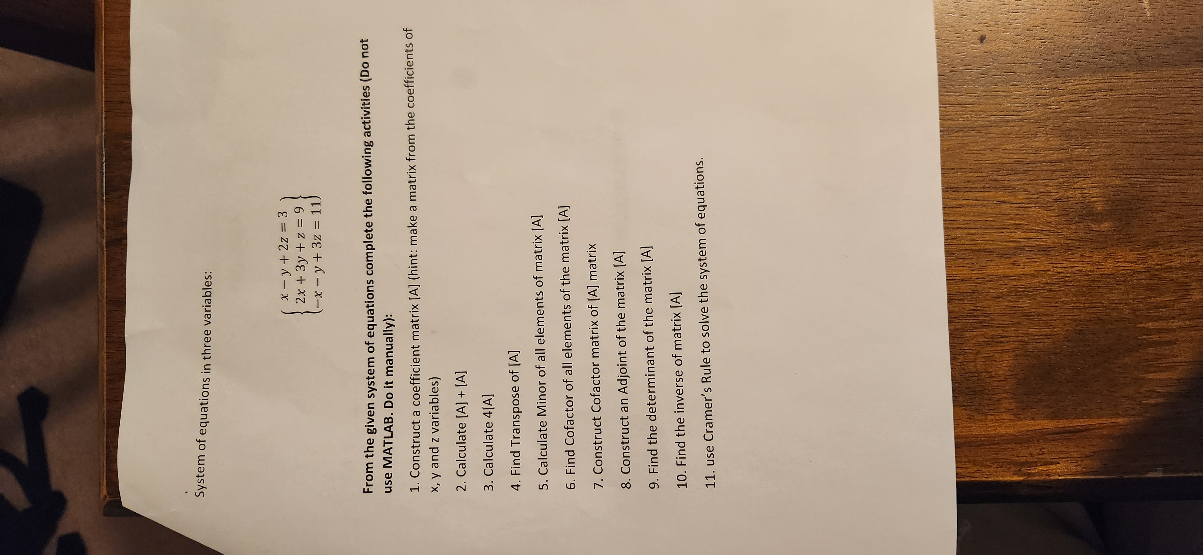Solved System of equestions in there vamiable{x - y + 2z = | Chegg.com