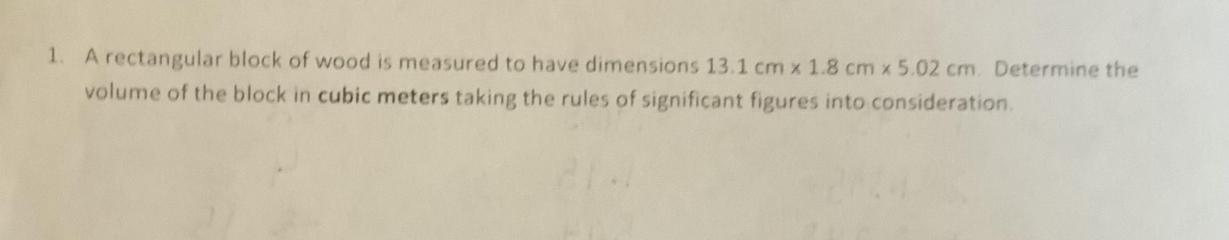 Solved 1. A rectangular block of wood is measured to have | Chegg.com