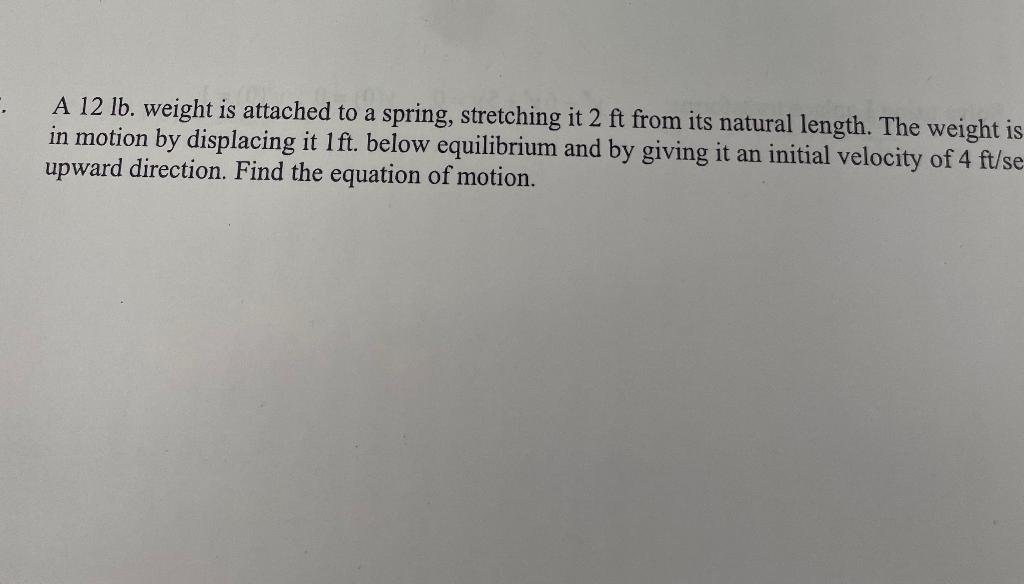 Solved A 12 lb. weight is attached to a spring, stretching | Chegg.com