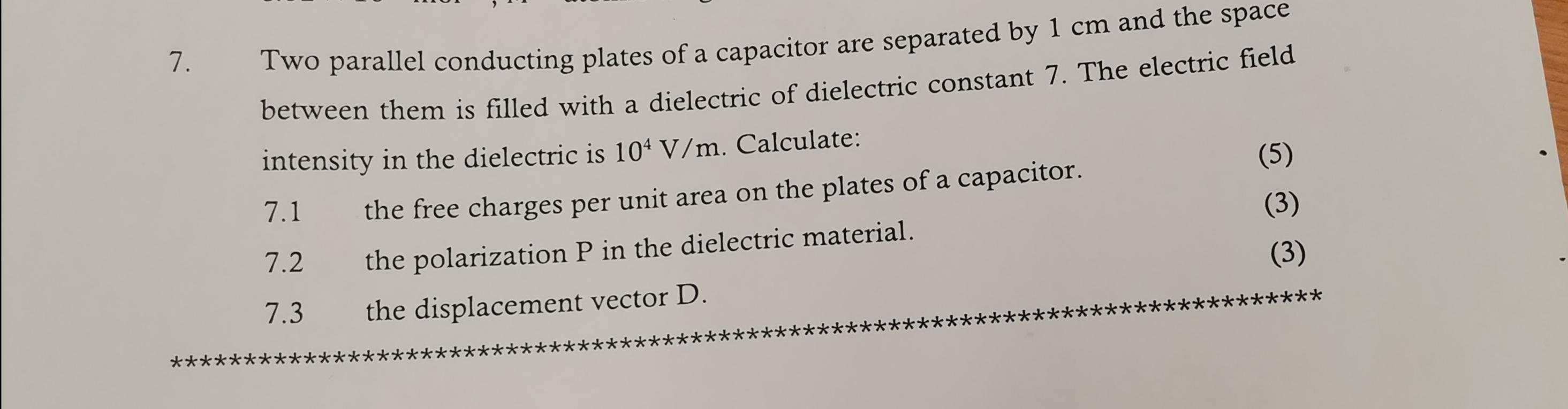 Solved 7 Two Parallel Conducting Plates Of A Capacitor Are