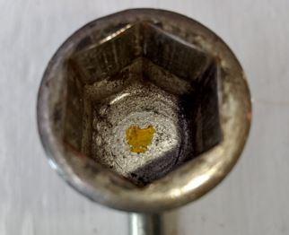 Solved Shown in the photo is a hexagon-shaped lug wrench | Chegg.com