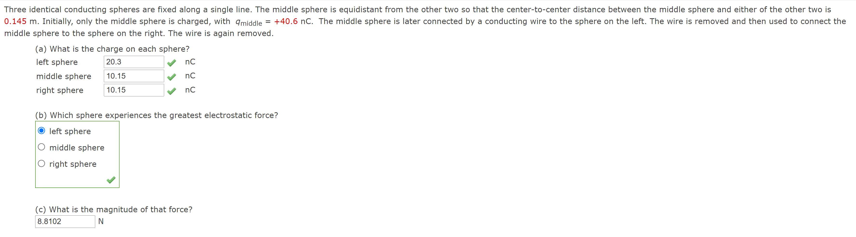 Solved = Three identical conducting spheres are fixed along | Chegg.com