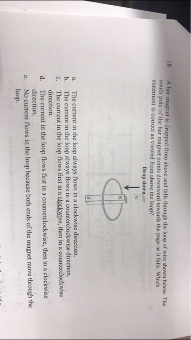 Solved 18 A bar magnet is dropped from above and falls | Chegg.com