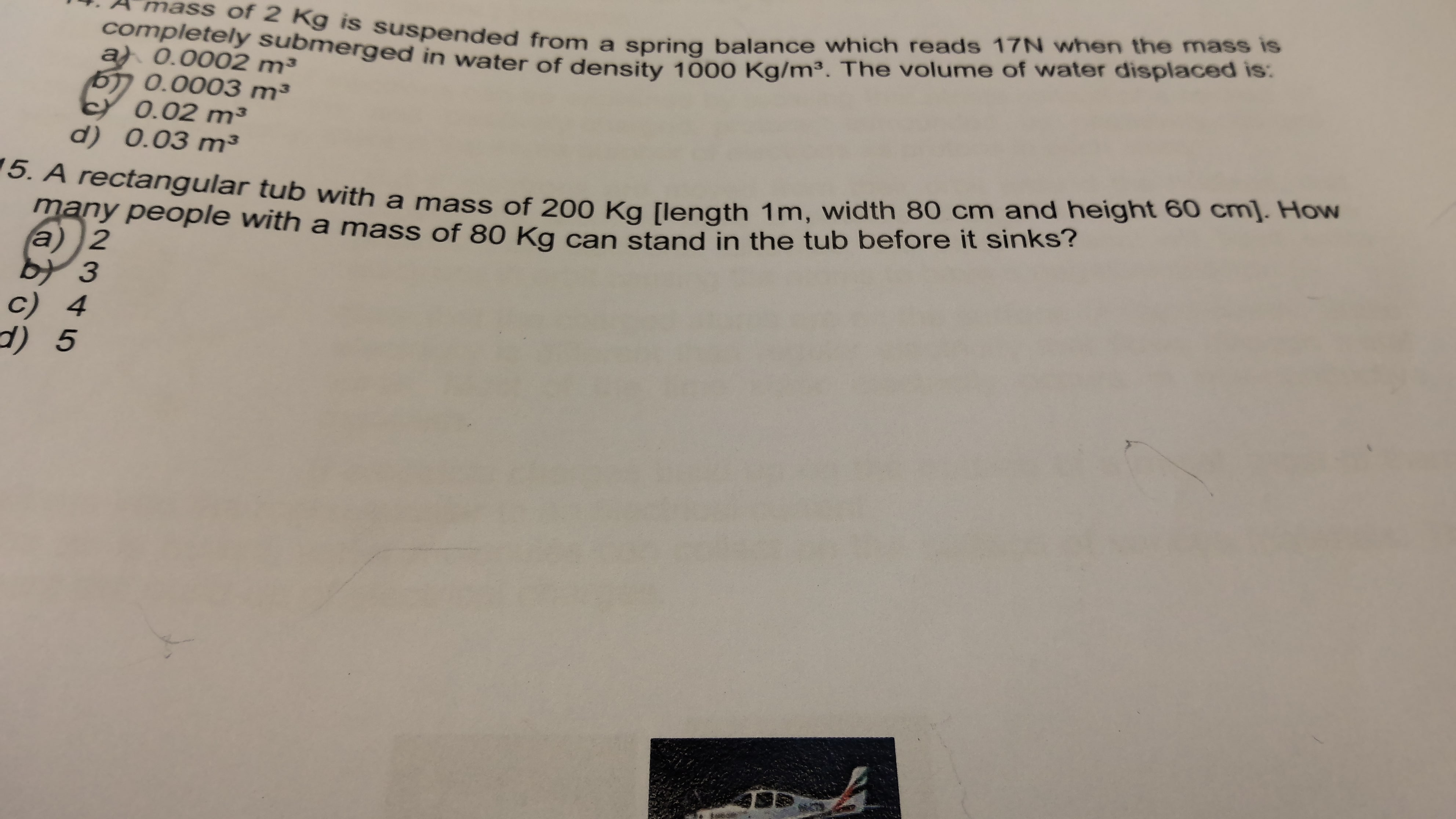 Solved comass of 2Kg is suspended from a spring balance | Chegg.com