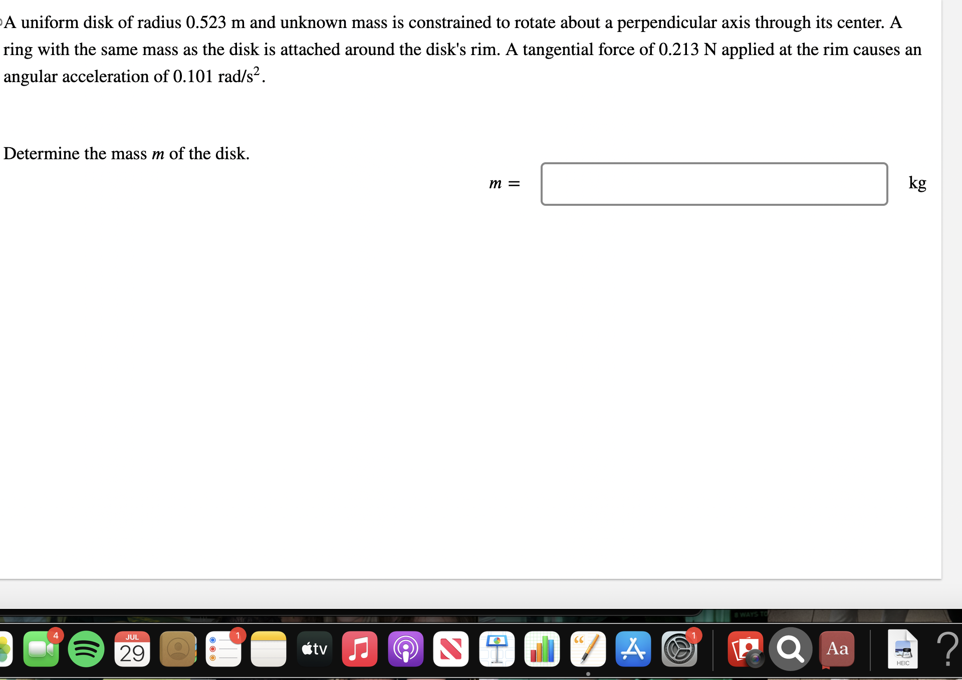 Solved A uniform disk of radius 0.523 ﻿m and unknown mass is | Chegg.com