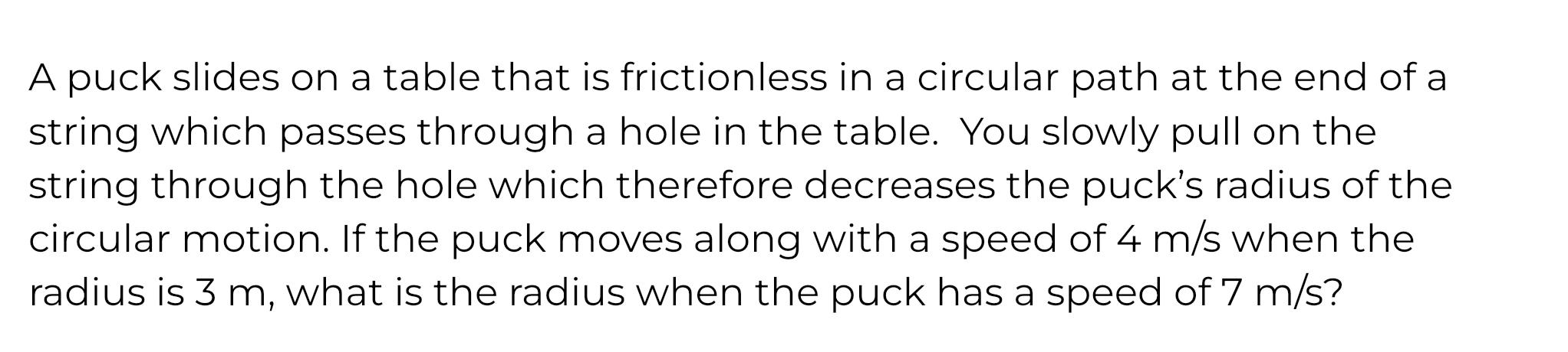 Solved A puck slides on a table that is frictionless in a | Chegg.com