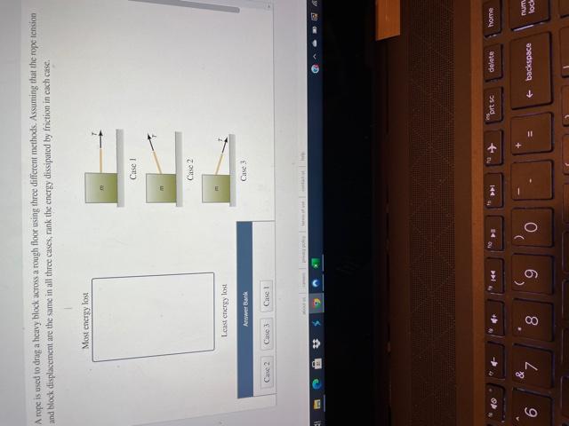 Solved A rope is used to drag a heavy block across a rough | Chegg.com