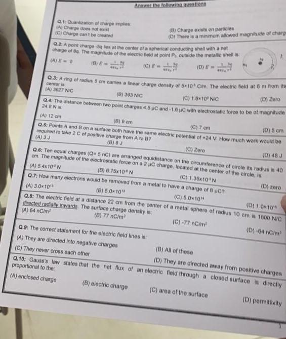 Solved Answer the following questions (3) Charge existe en | Chegg.com