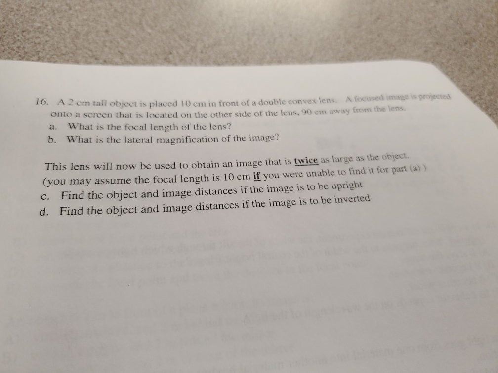 Solved 10. A 2 cm tall object is placed 10 cm in front of a | Chegg.com
