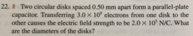 Solved 22. | Two circular disks spaced 0.50 mm apart form a | Chegg.com