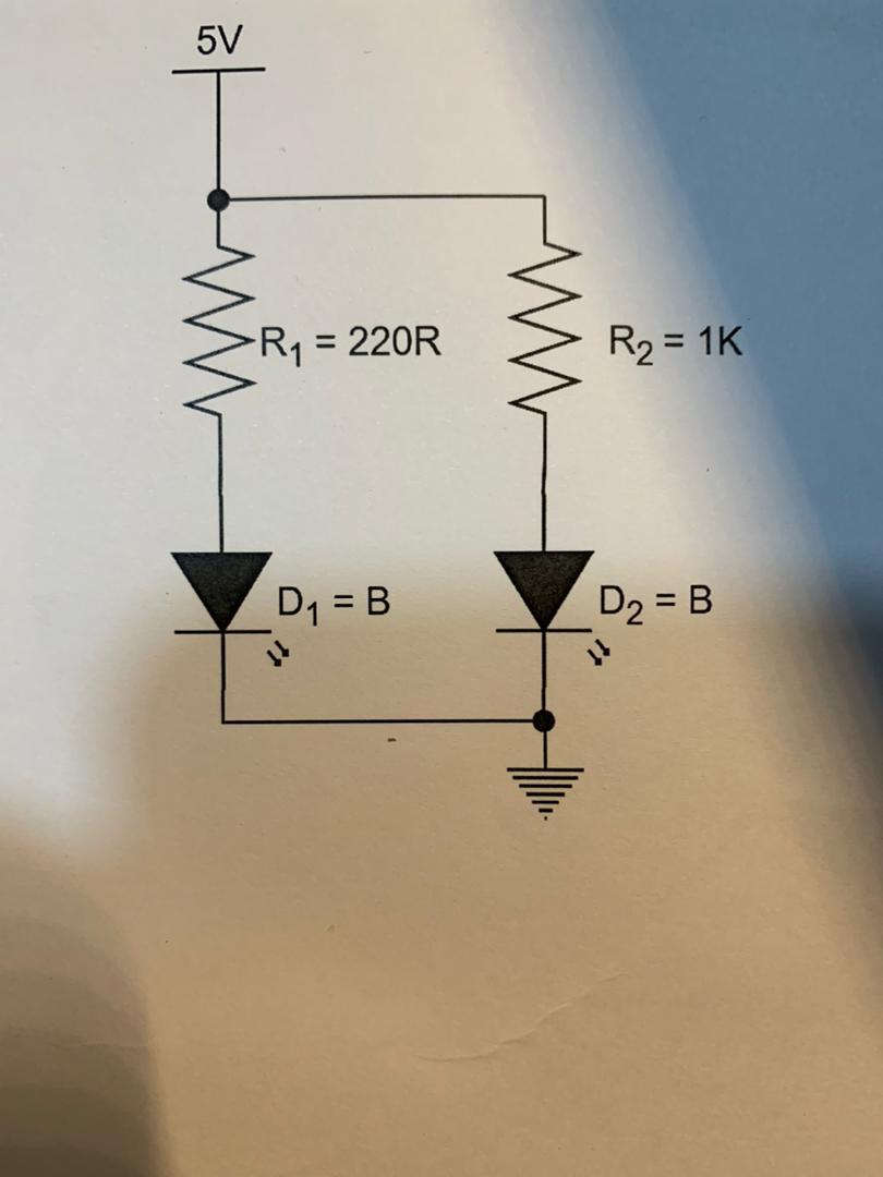 Solved Please build this circuit on a breadboard shown in | Chegg.com