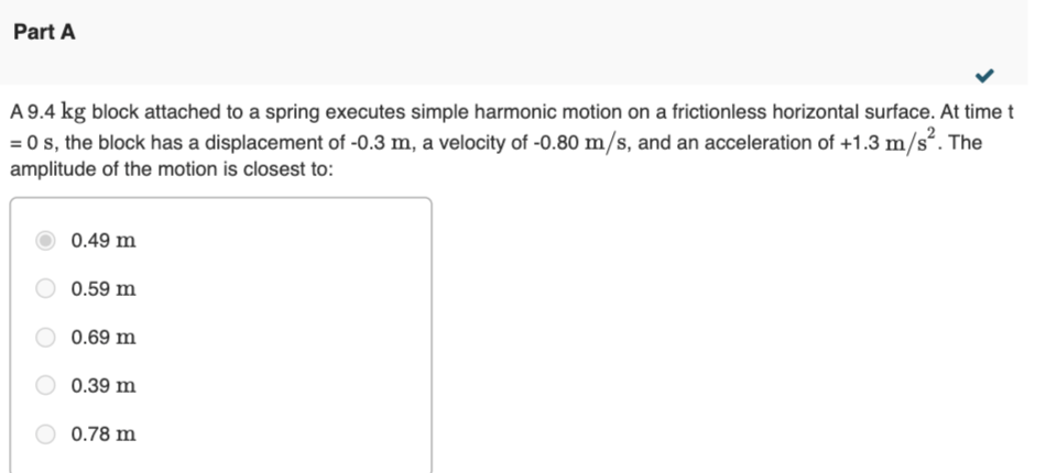 Solved Part complete A 9.4 kg block attached to a spring | Chegg.com