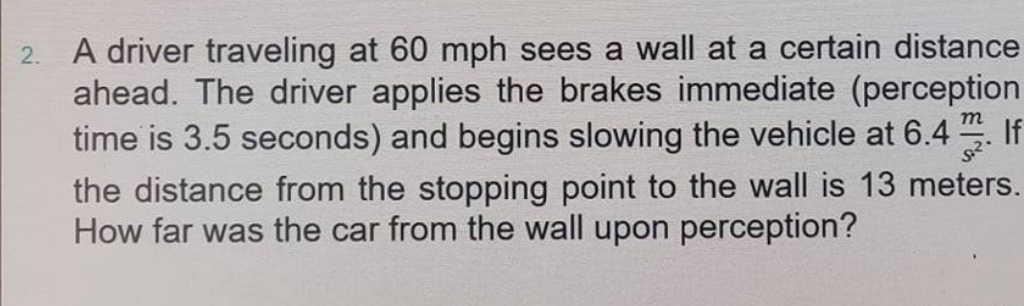 Solved 2. A driver traveling at 60 mph sees a wall at a | Chegg.com