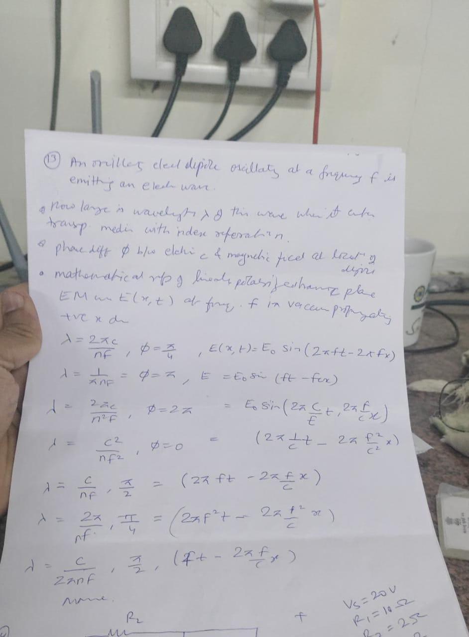 (13) An onilles eled dipile oscillaty at a friqung f | Chegg.com