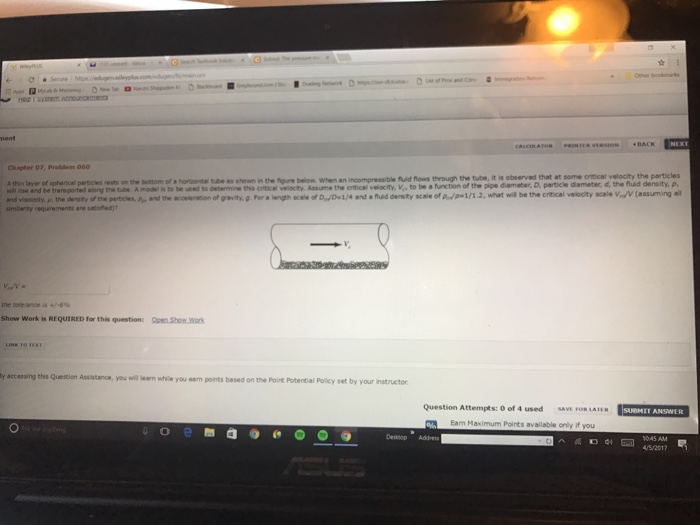 Solved A thin layer of spherical particles rests on the | Chegg.com