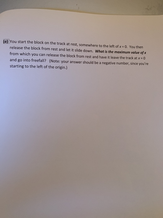 Solved A small block slides down a frictionless track whose | Chegg.com