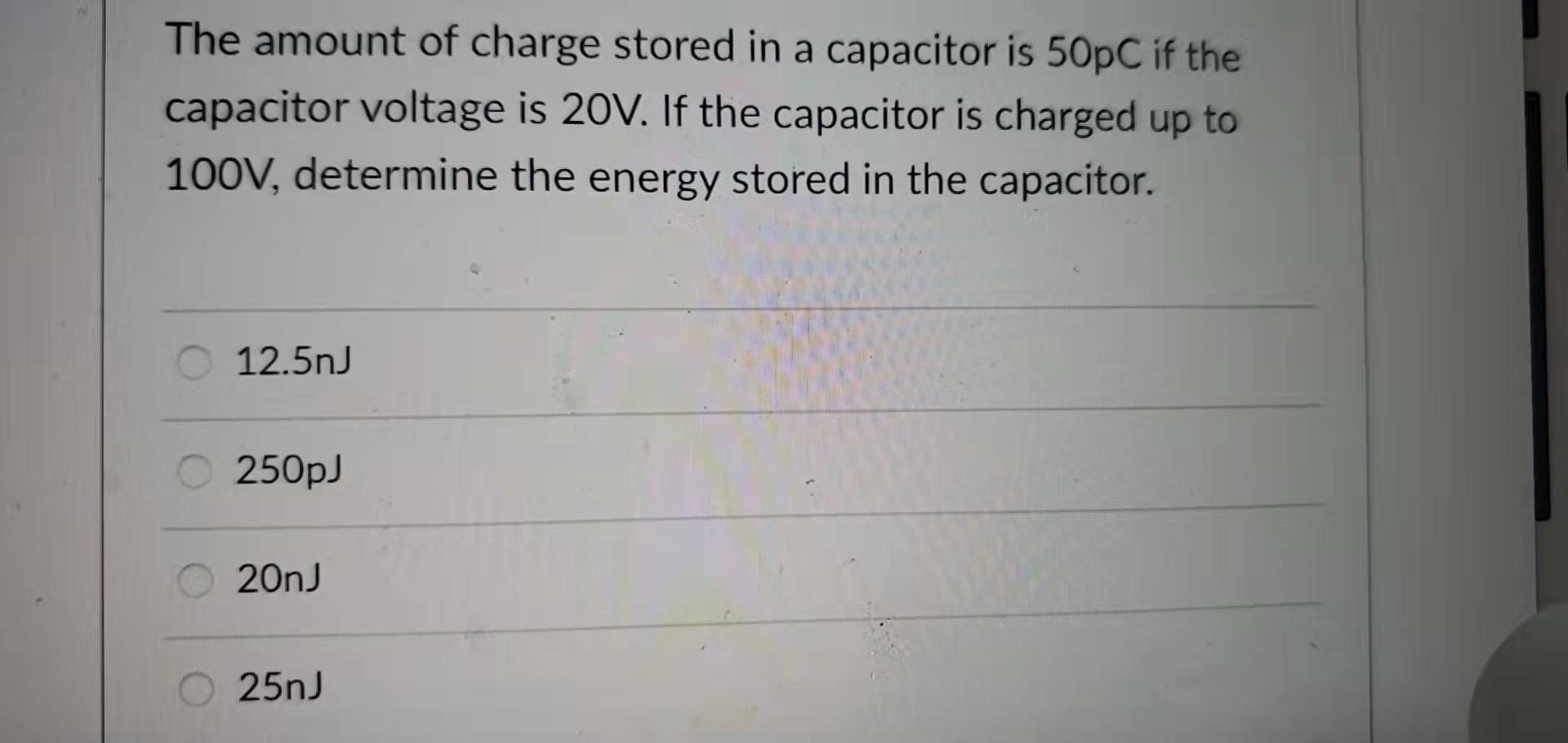 Solved The amount of charge stored in a capacitor is 50pC if | Chegg.com