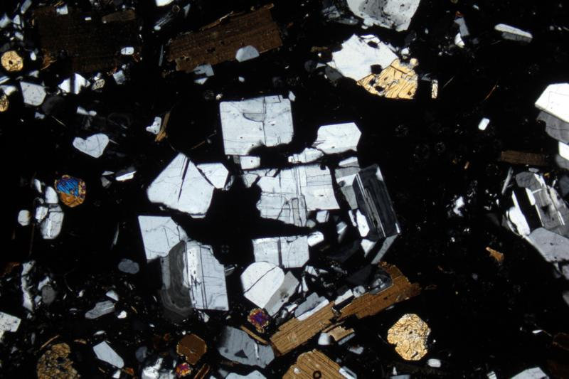 Solved Please describe the given thin section of volcanic | Chegg.com