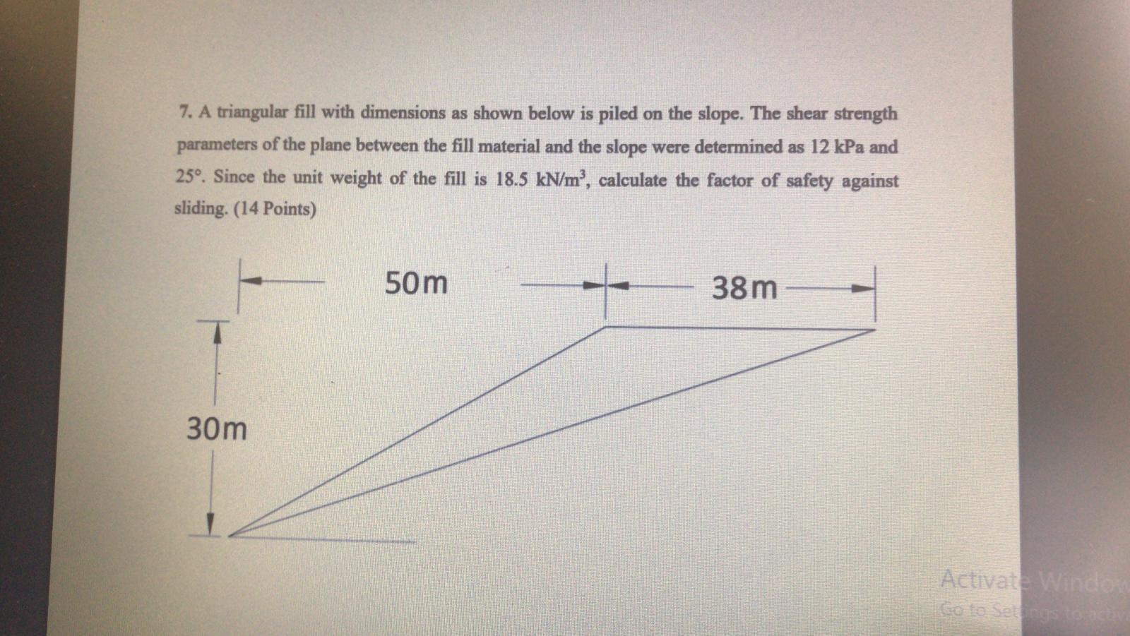 Solved A triangular fill with dimensions as shown below is | Chegg.com