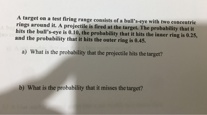 Solved A target on a test firing range consists of a | Chegg.com