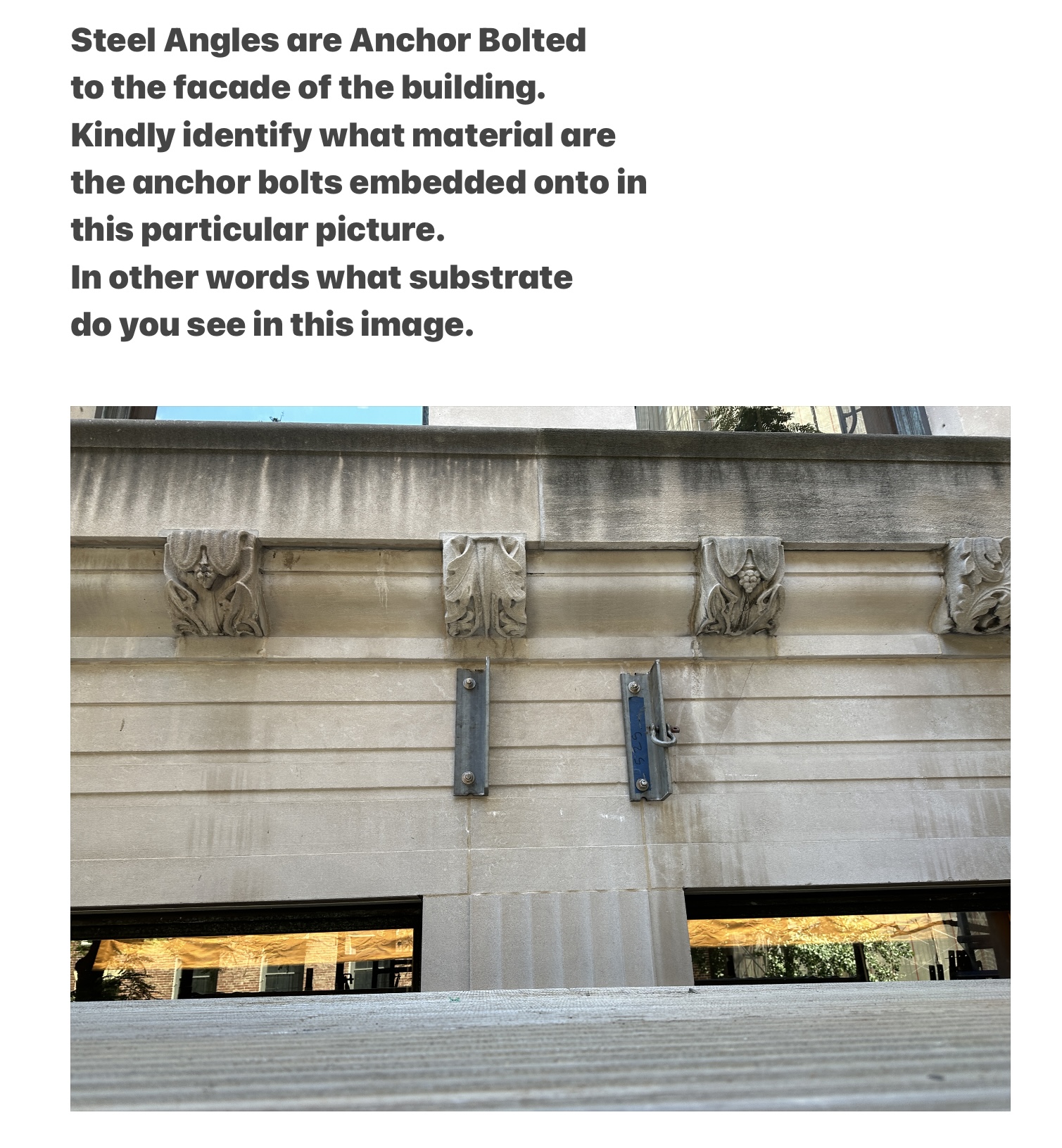 [Solved]: Steel Angles are Anchor Bolted to the facade of t