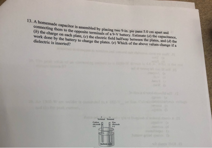 Solved 13. A homemade capacitor is assembled by placing two | Chegg.com