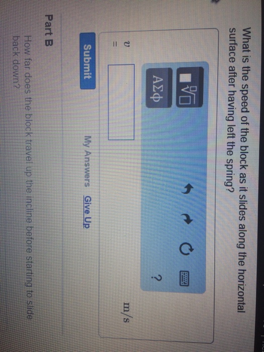 Solved A 2.00-kg block is pushed against a spring with | Chegg.com