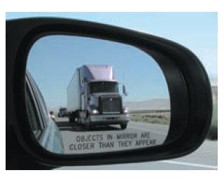 Solved The writing on the passenger-side mirror of your car | Chegg.com