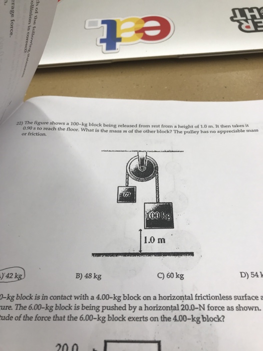 Solved LH 22) The figure shows a 100-kg block being released | Chegg.com