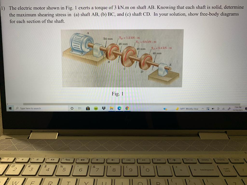 Solved 1) The electric motor shown in Fig. 1 exerts a torque | Chegg.com