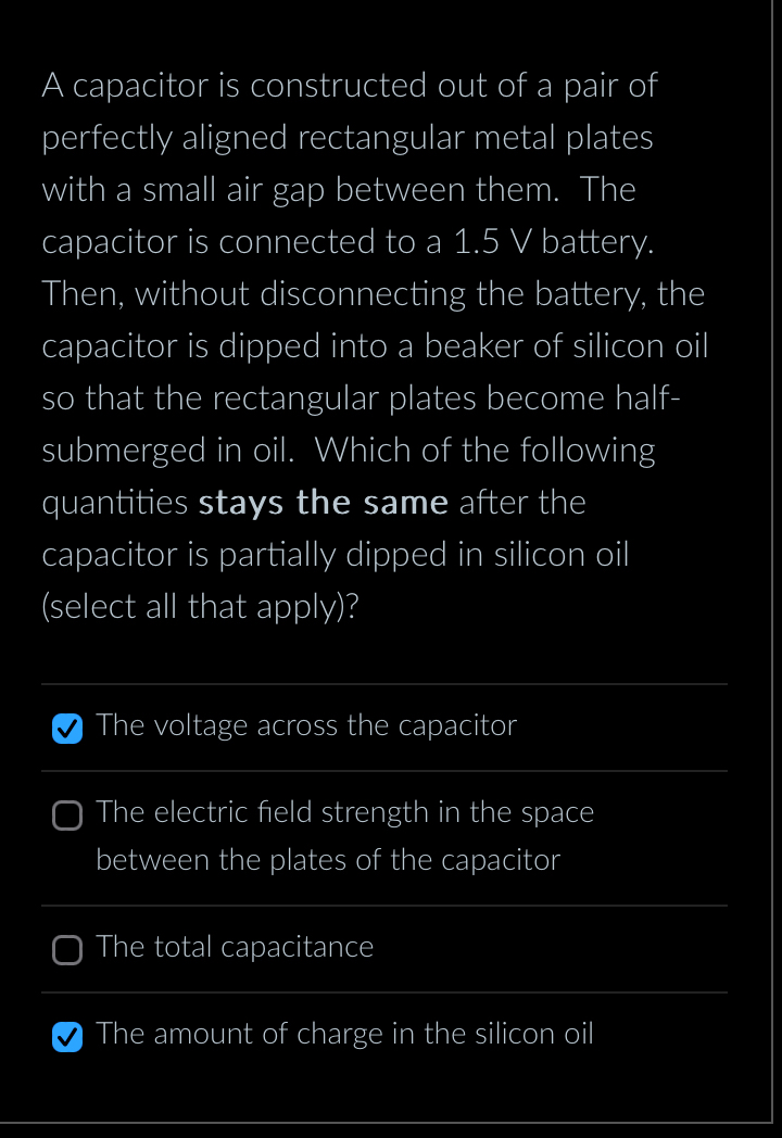 Solved A capacitor is constructed out of a pair of perfectly | Chegg.com